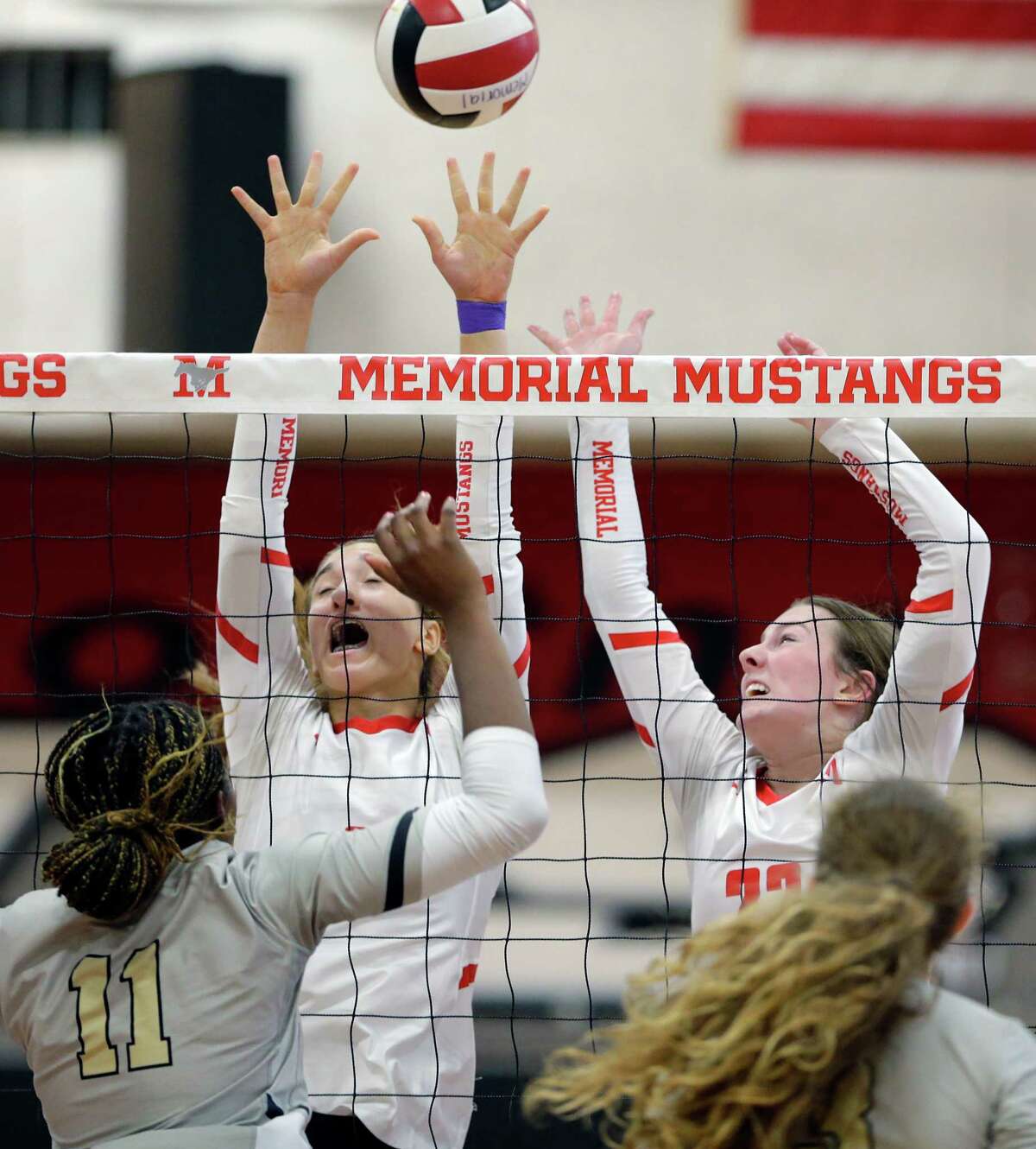 High school volleyball: Foster downs Memorial in four sets