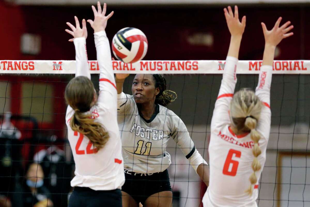 High school volleyball: Foster downs Memorial in four sets