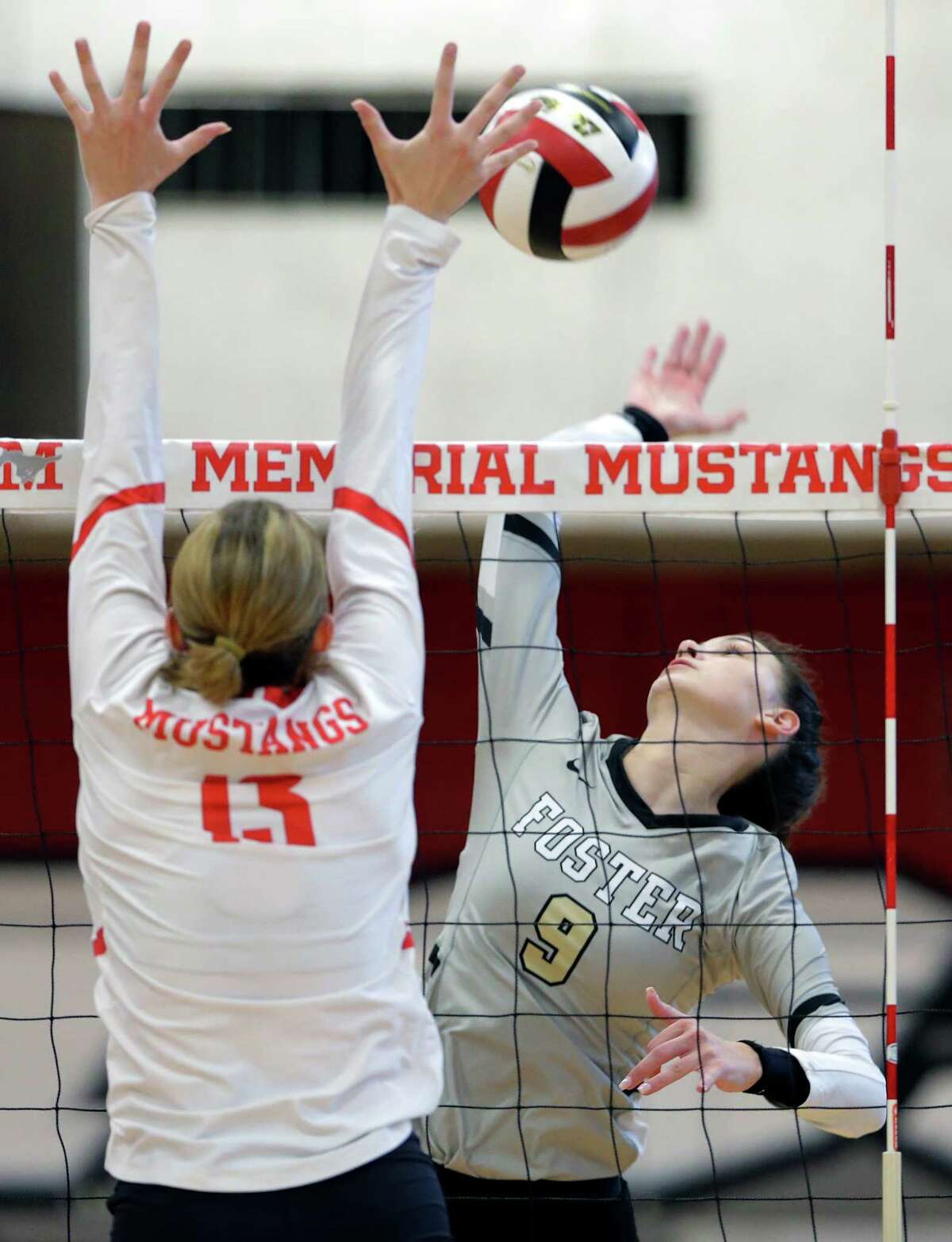 High school volleyball: Foster downs Memorial in four sets