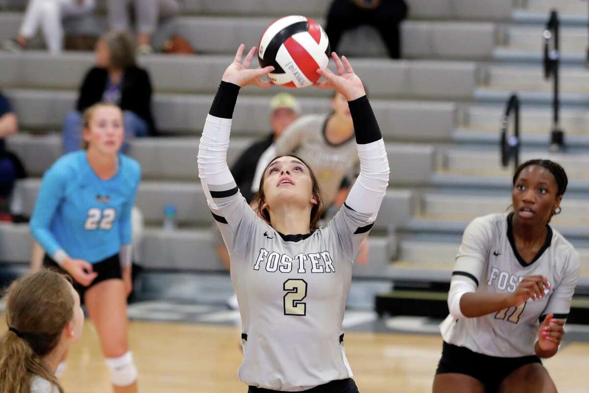 High school volleyball: Foster downs Memorial in four sets