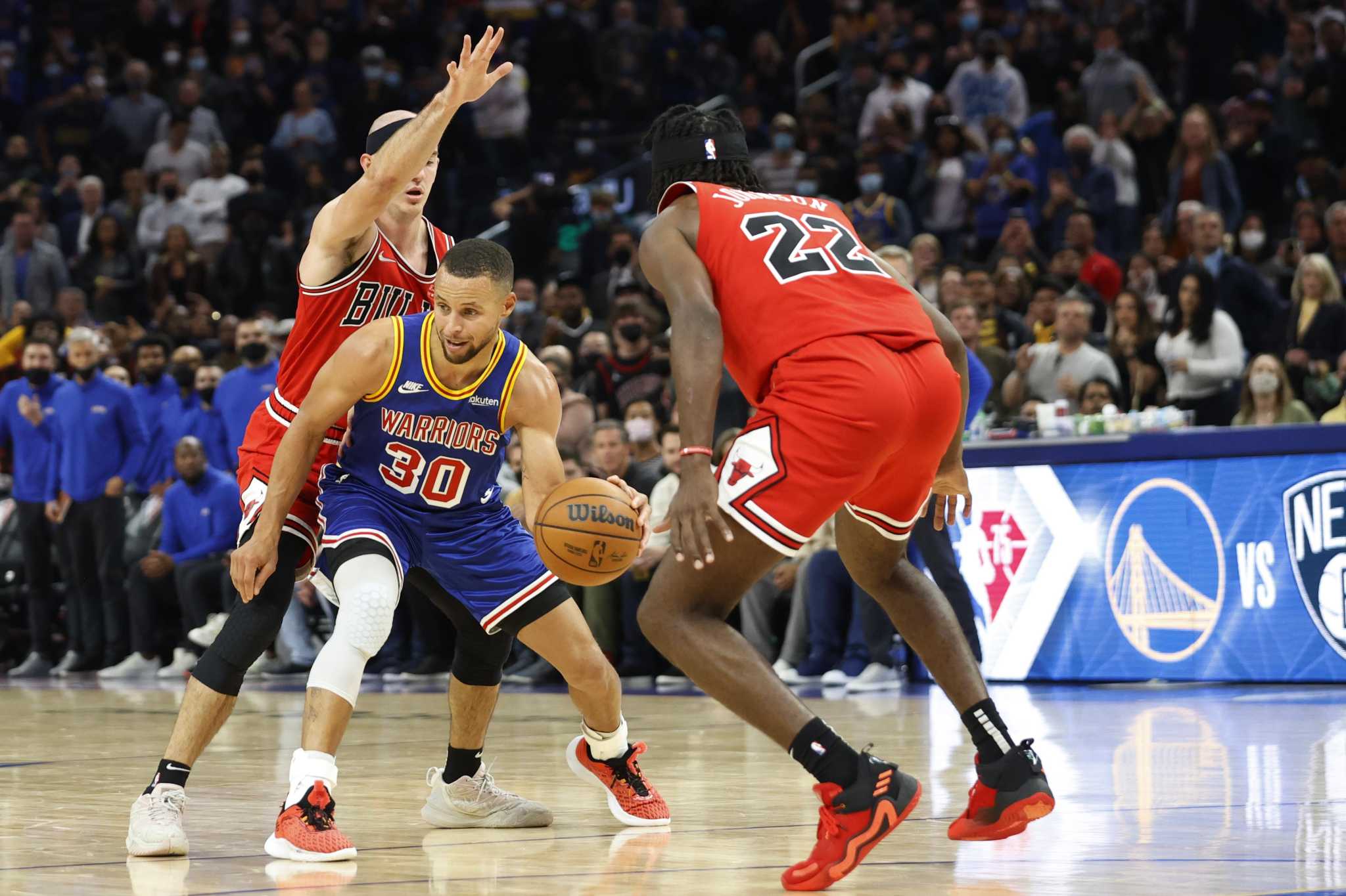 Spurs sign Johnson and Kuhse to finalize camp roster