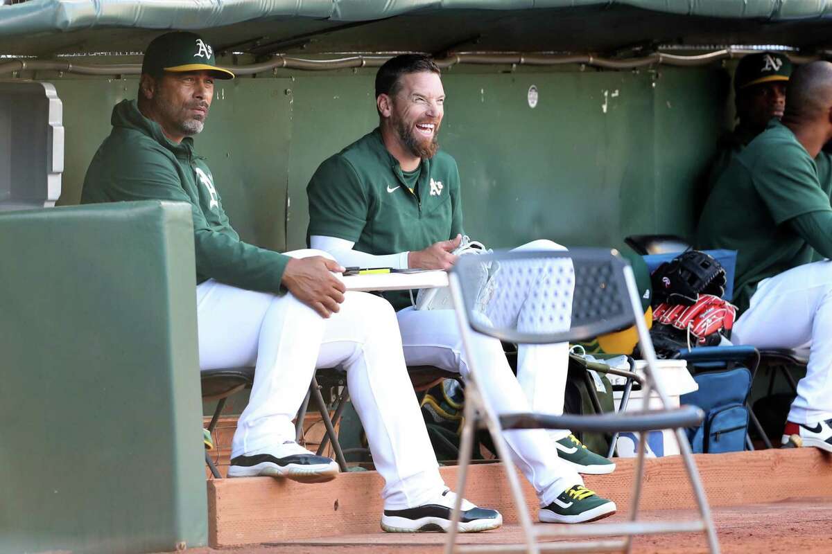 How baseball bonds A’s scout John Hughes and his son, bullpen catcher ...