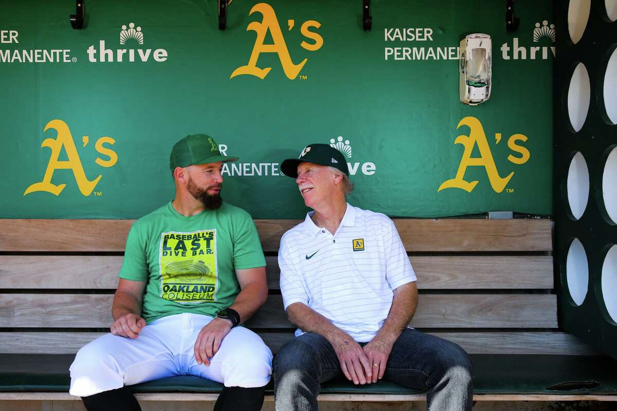 How baseball bonds A’s scout John Hughes and his son, bullpen catcher ...