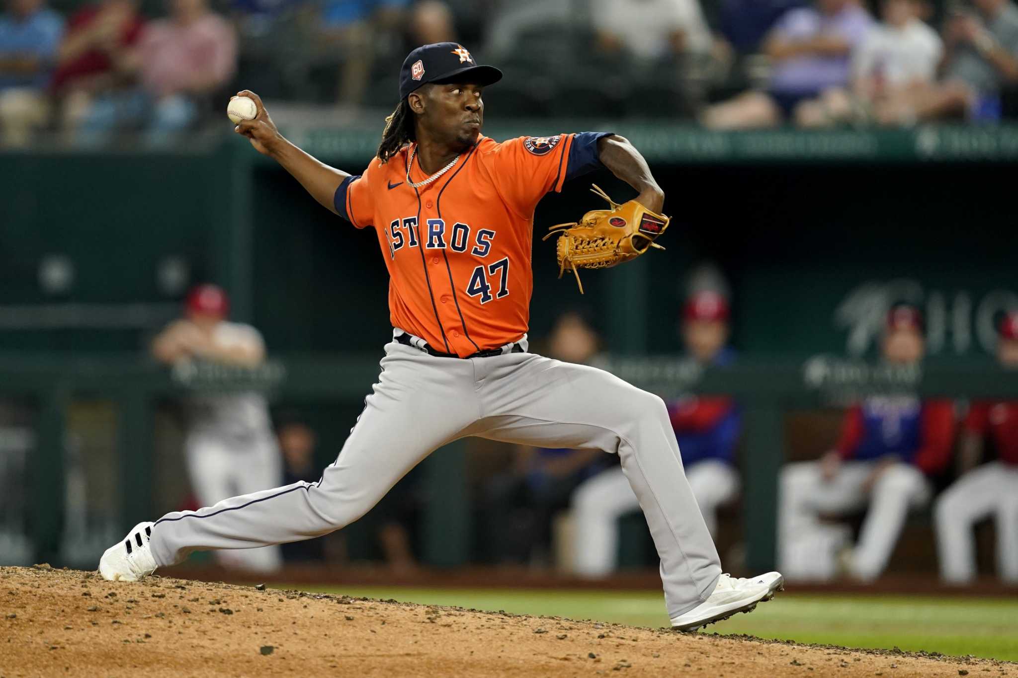 Houston Astros' bullpen holds off Rangers to complete series sweep