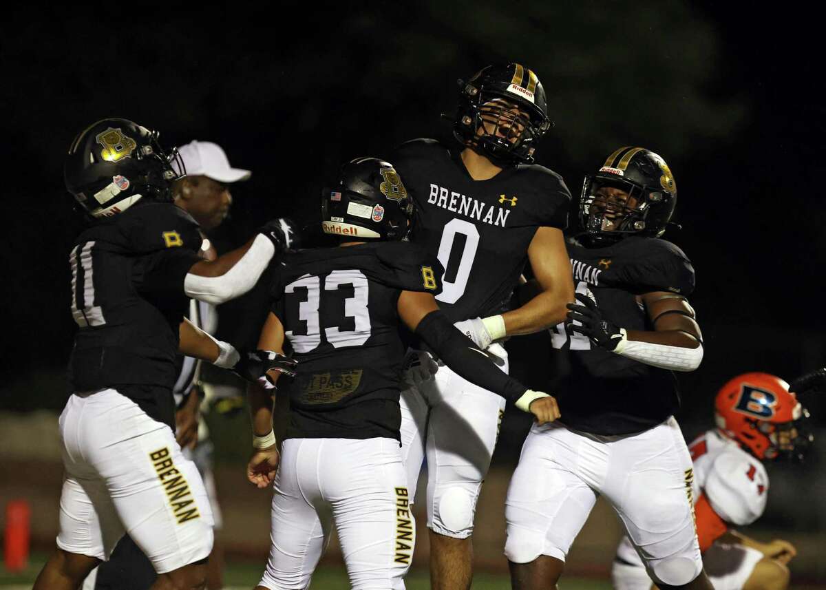 Dubose’s 4 TD passes fuel Brennan rout of Brandeis