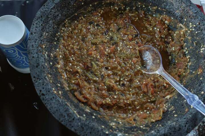 Oakland's Tacos Mama Cuca makes bacon-wrapped burritos. Are they any good?