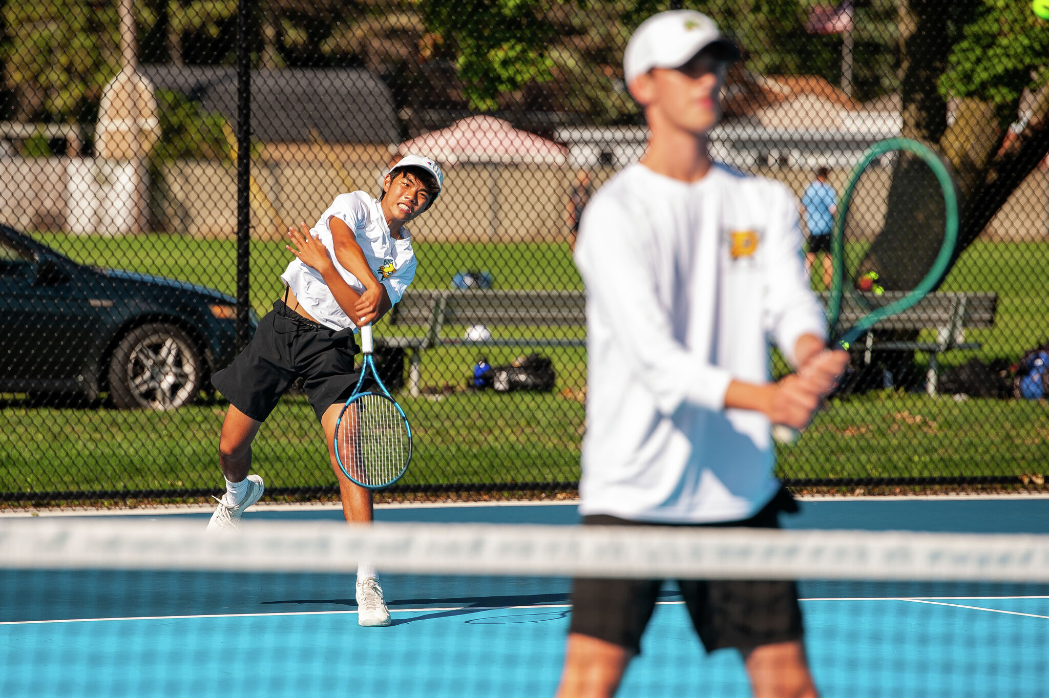 PHOTOS: Midland and Dow high tennis teams clash