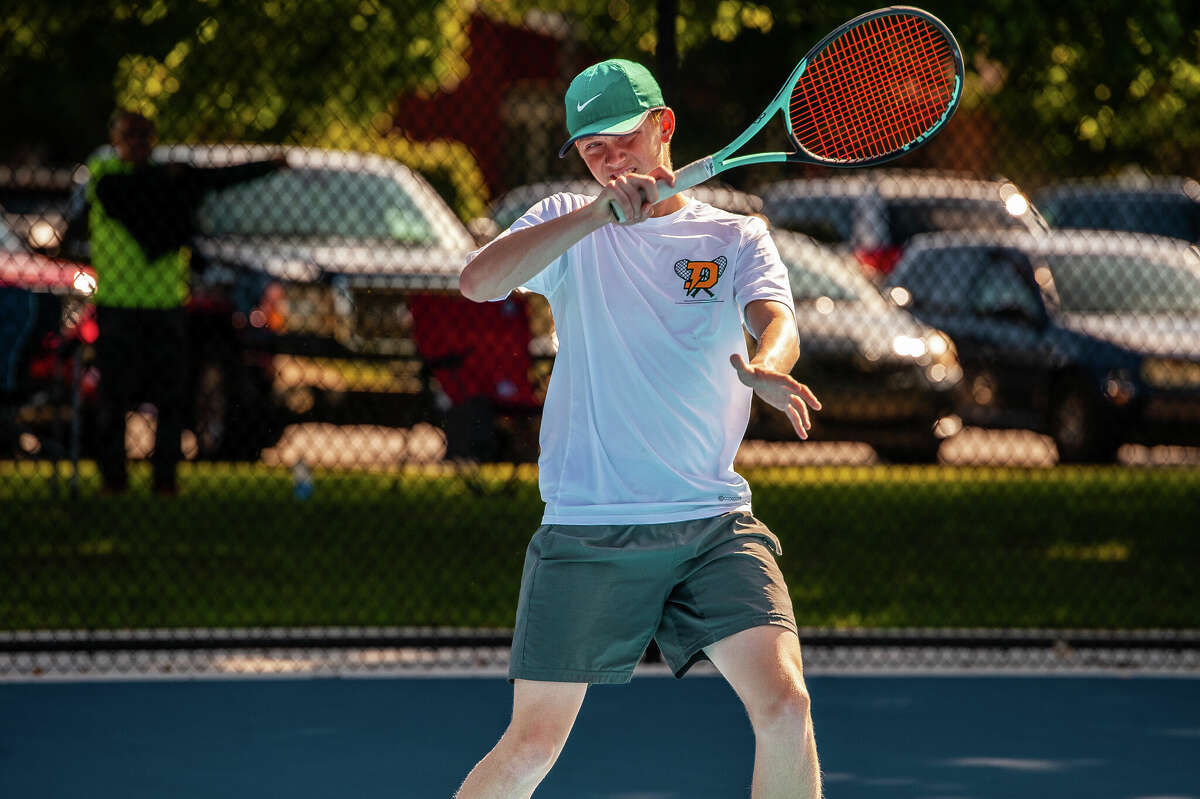 PHOTOS: Midland and Dow high tennis teams clash