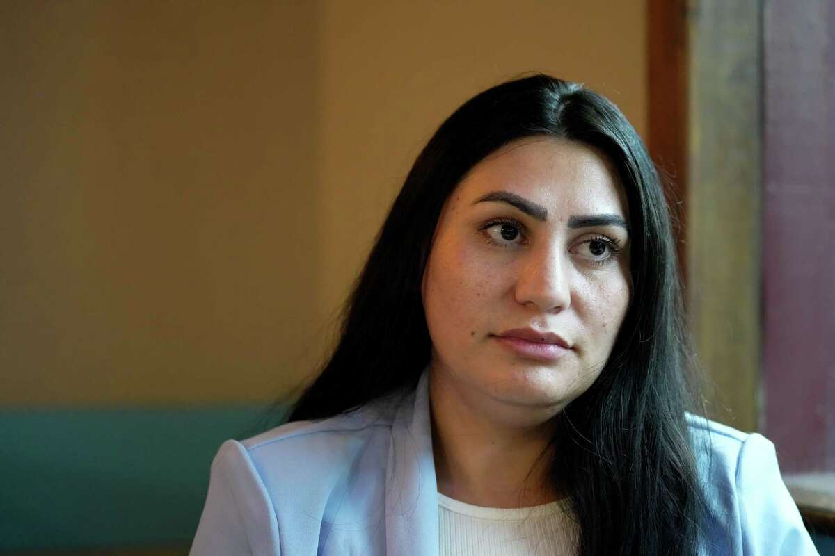Aghan woman in Houston says her kids are stuck with her abusive husband