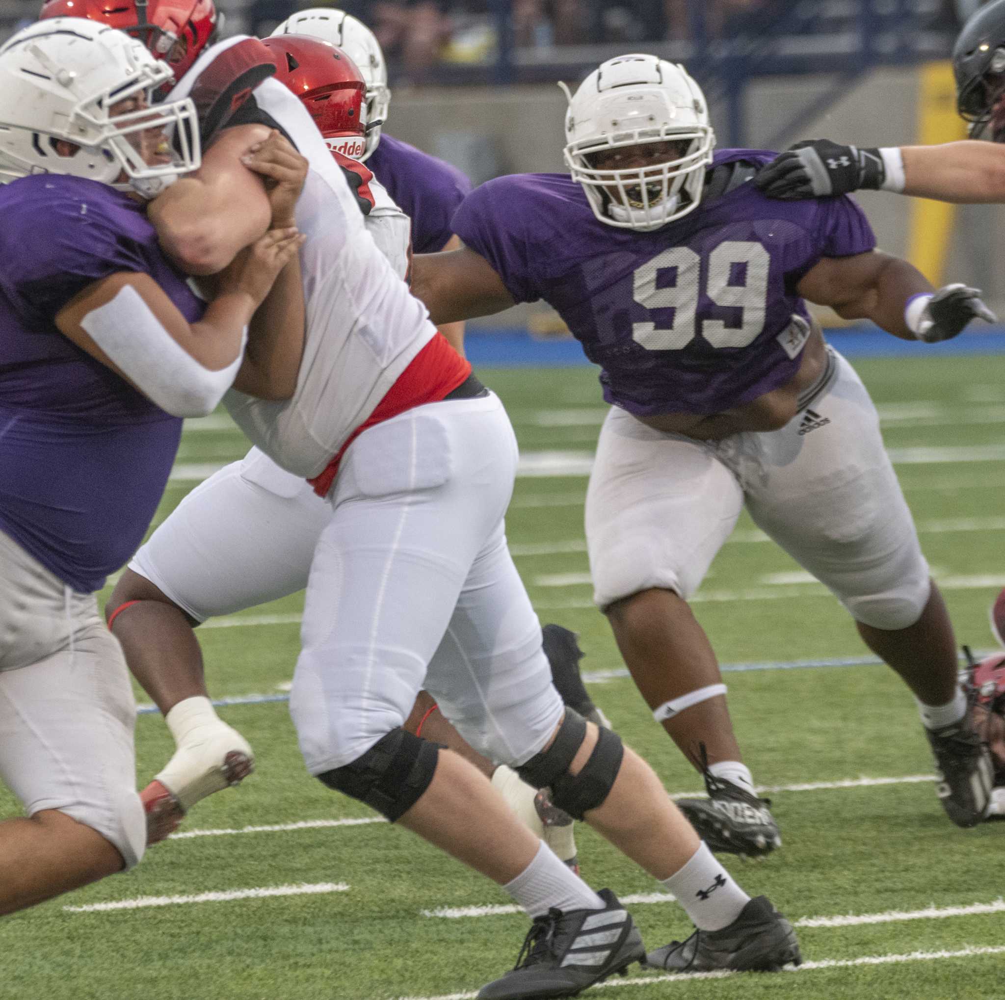 HS FOOTBALL: Rollie making an impression as Midland High nose guard