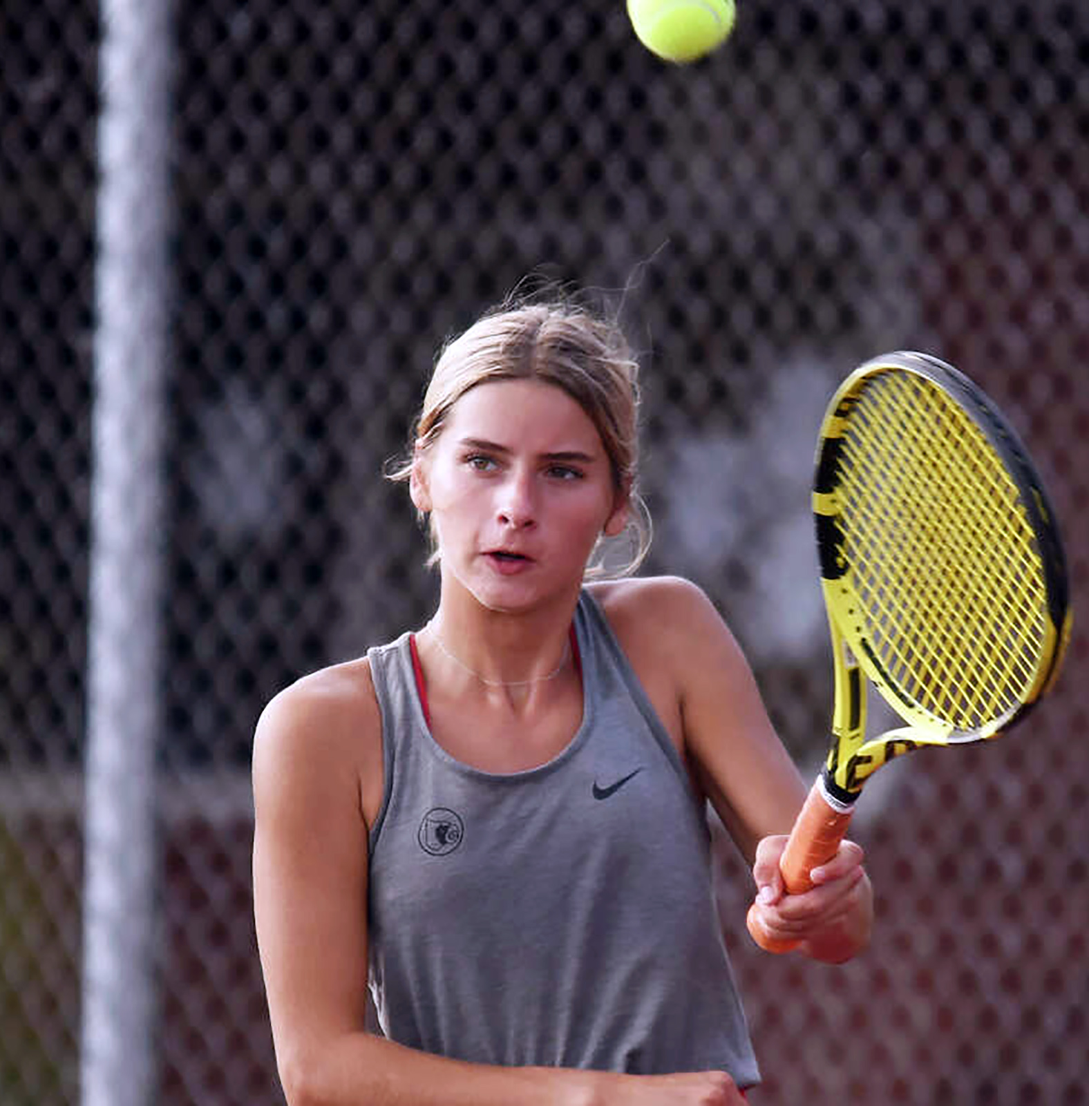 Alton defeated Marquette 9-0 in the city tennis showdown
