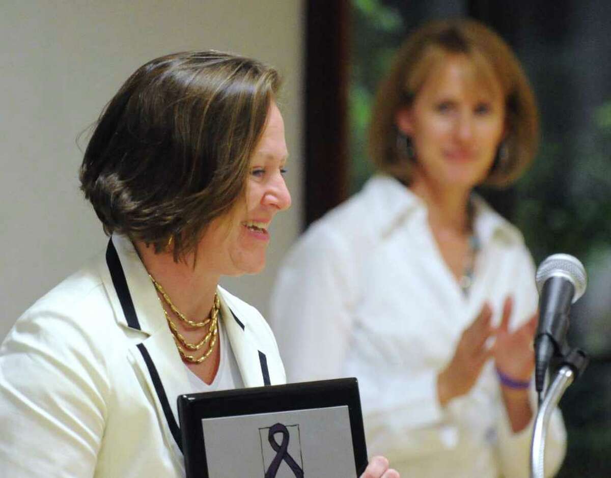 Victims and survivors of domestic violence honored at vigil