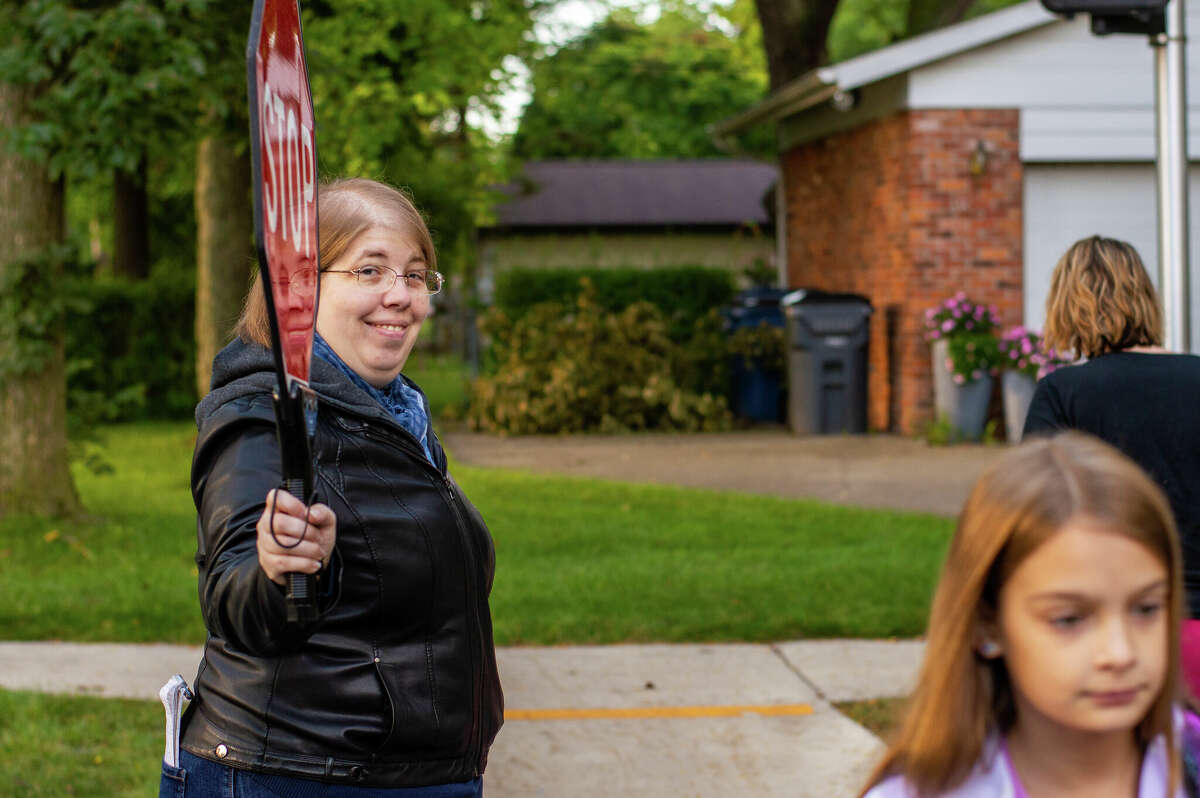 School crossing guard Tom Babel shows kindness and vigilance in helping ...