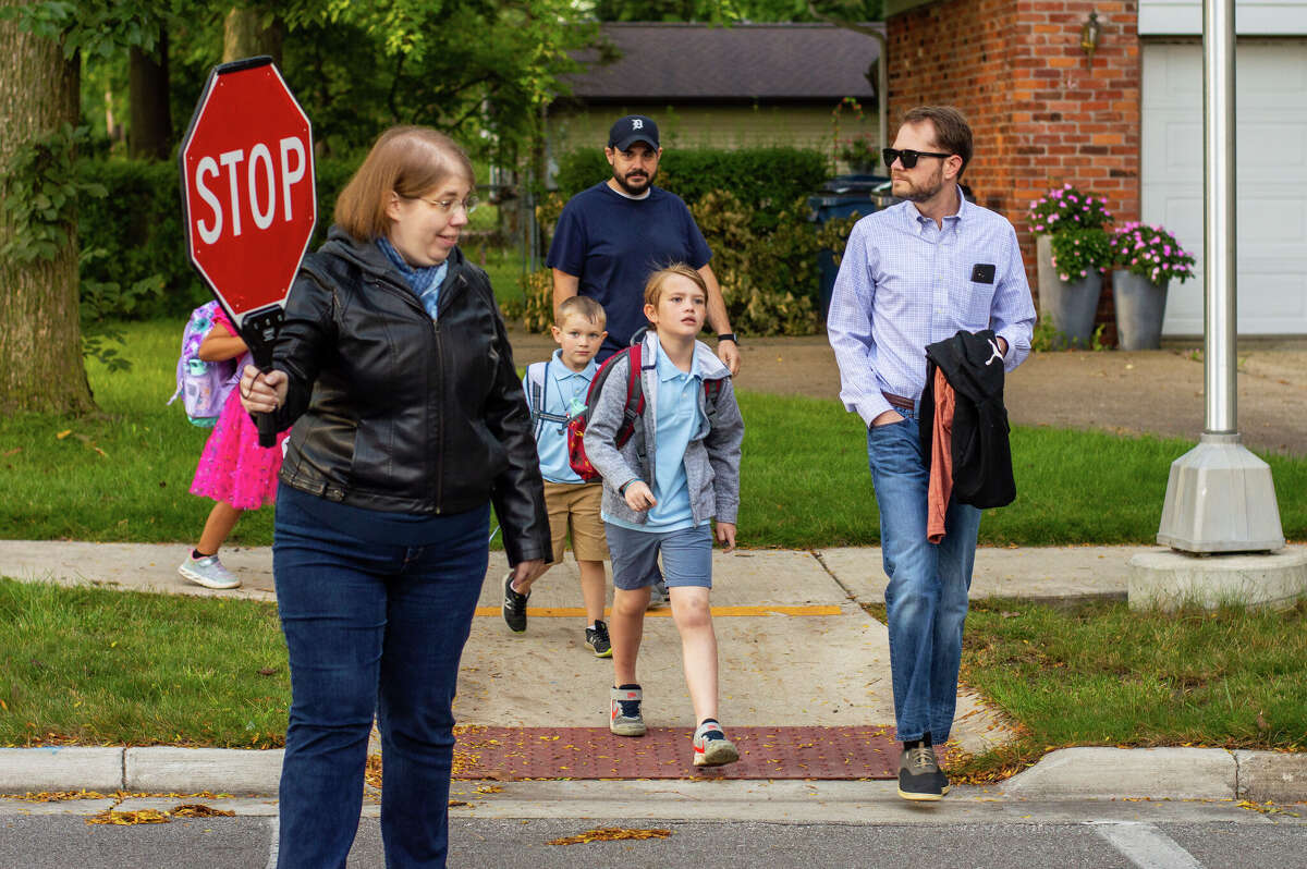 School crossing guard Tom Babel shows kindness and vigilance in helping ...