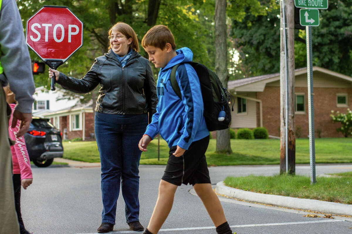 School crossing guard Tom Babel shows kindness and vigilance in helping ...