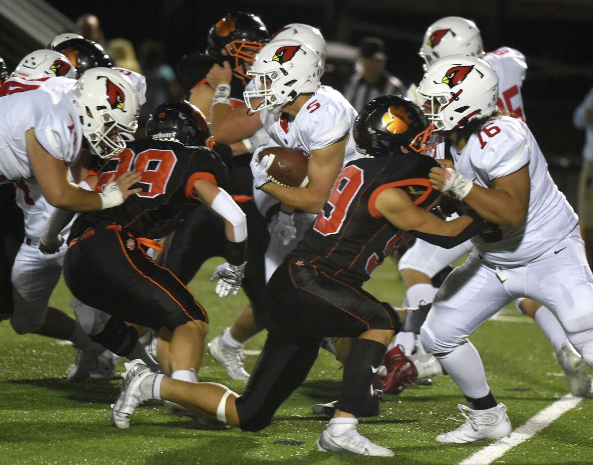 Top-ranked Greenwich football overcame Ridgefield in FCIAC game