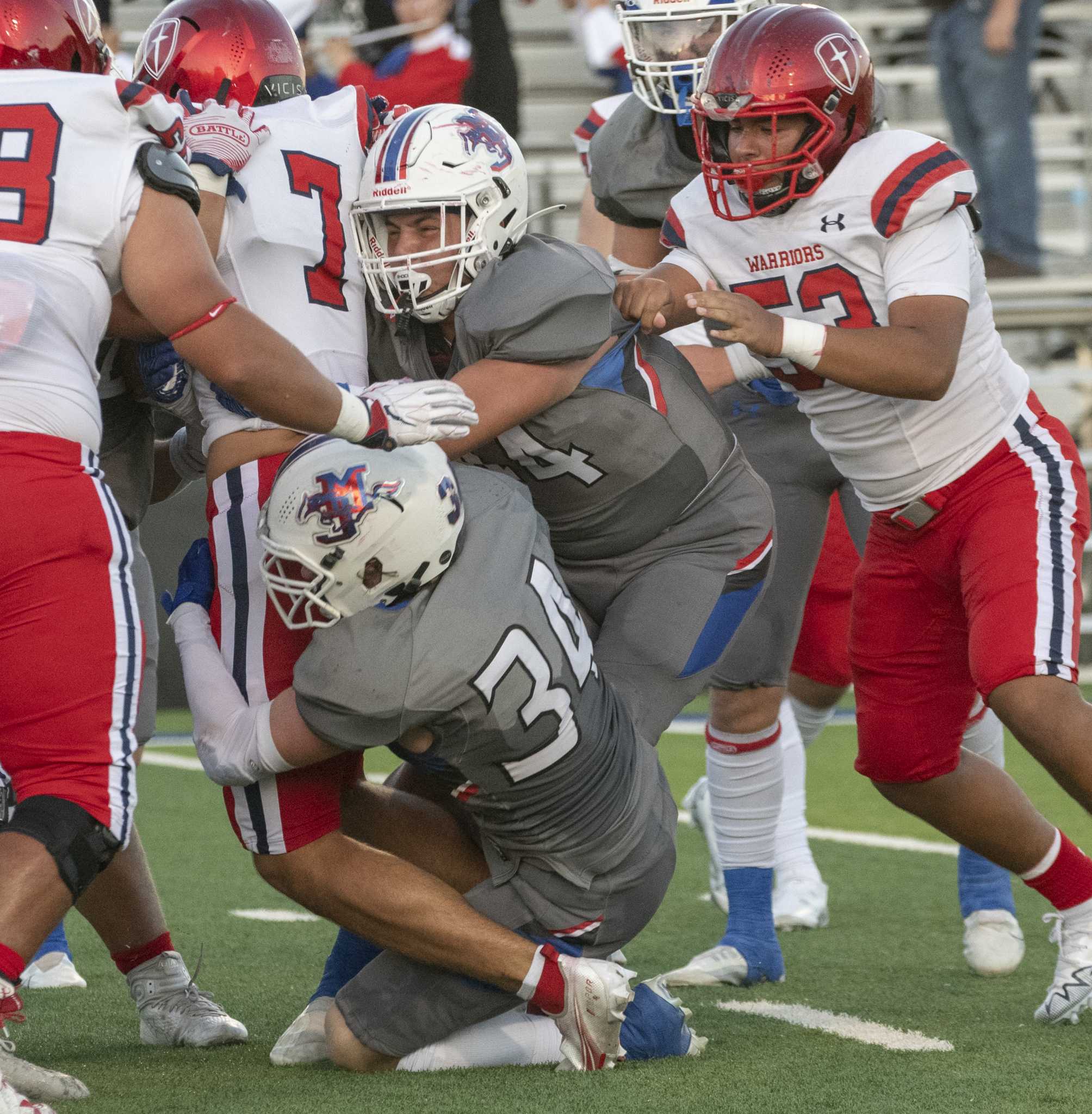 HS FOOTBALL: Off-the-field boxer Johnson brings toughness as MCS D-end