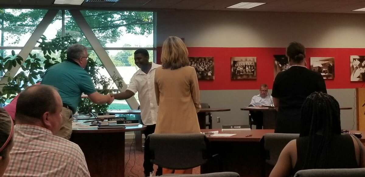 Alton school board honors award winning students