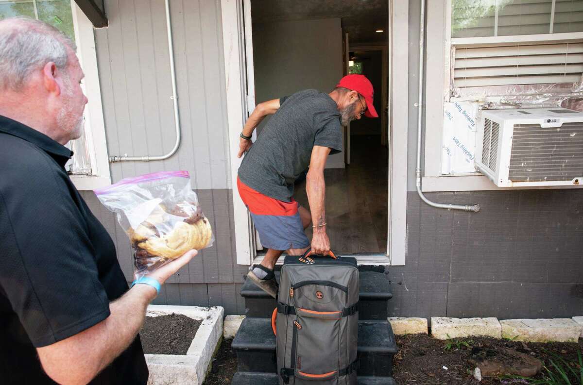Houston friends move from encampment to quiet apartments