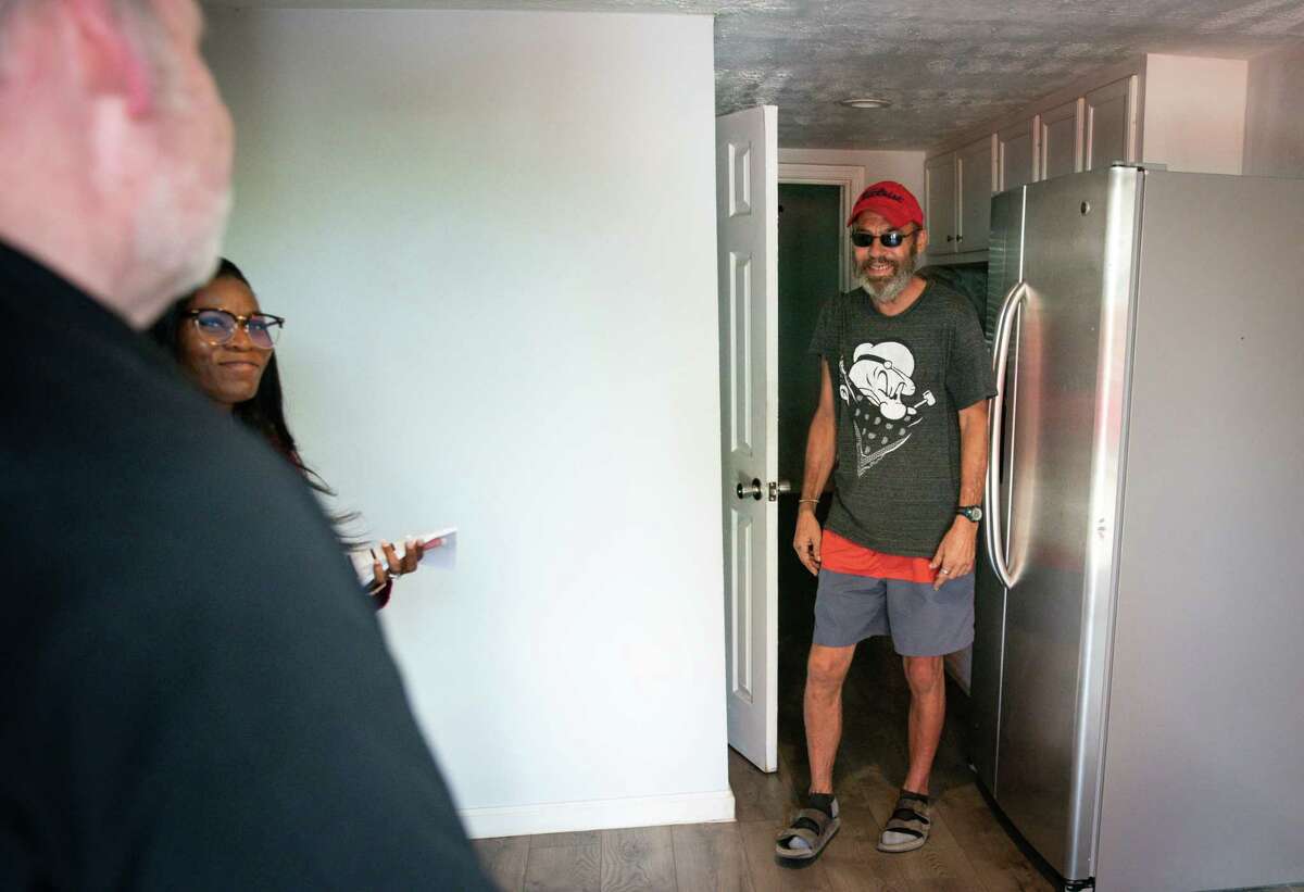 Houston friends move from encampment to quiet apartments