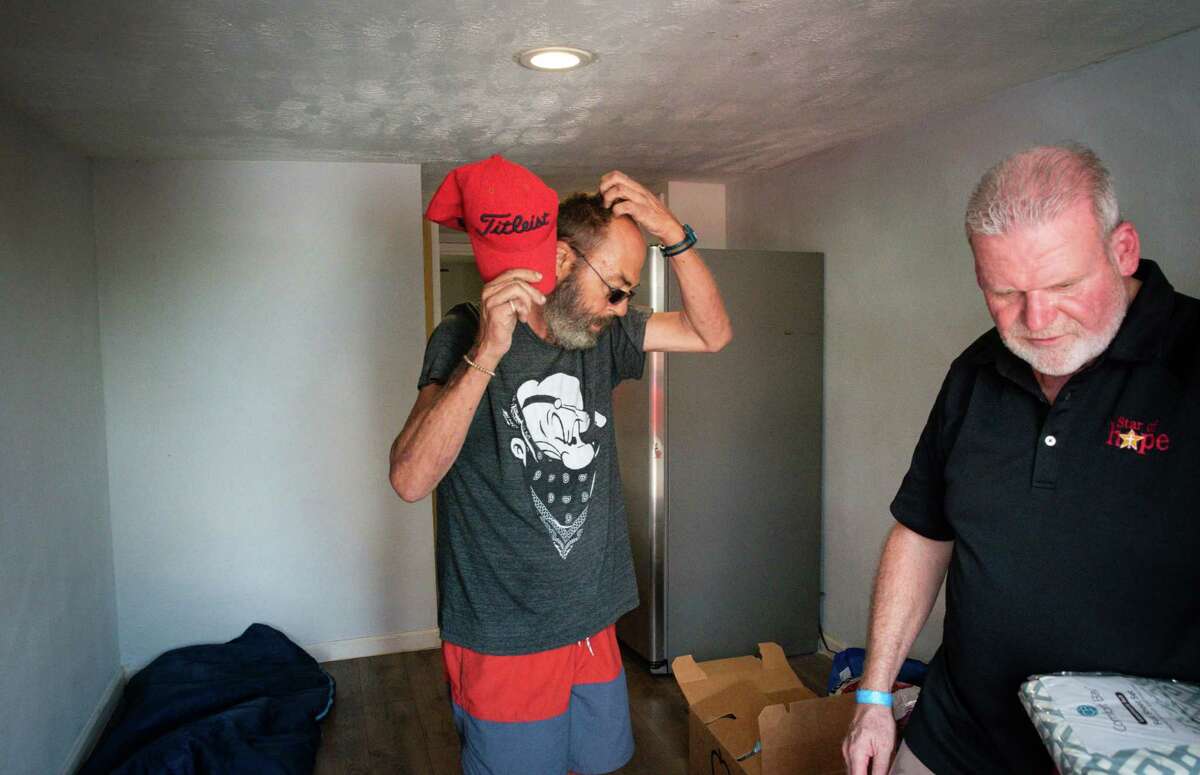 Houston friends move from encampment to quiet apartments