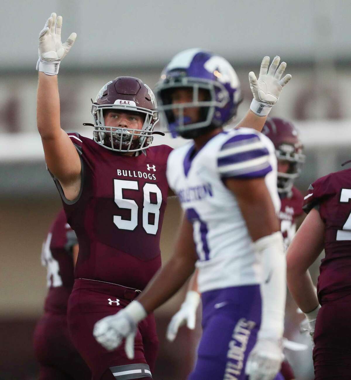 Angleton holds off Magnolia for district road victory