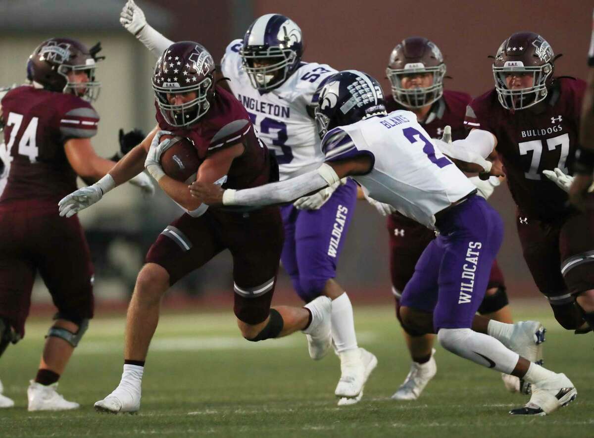 Angleton holds off Magnolia for district road victory