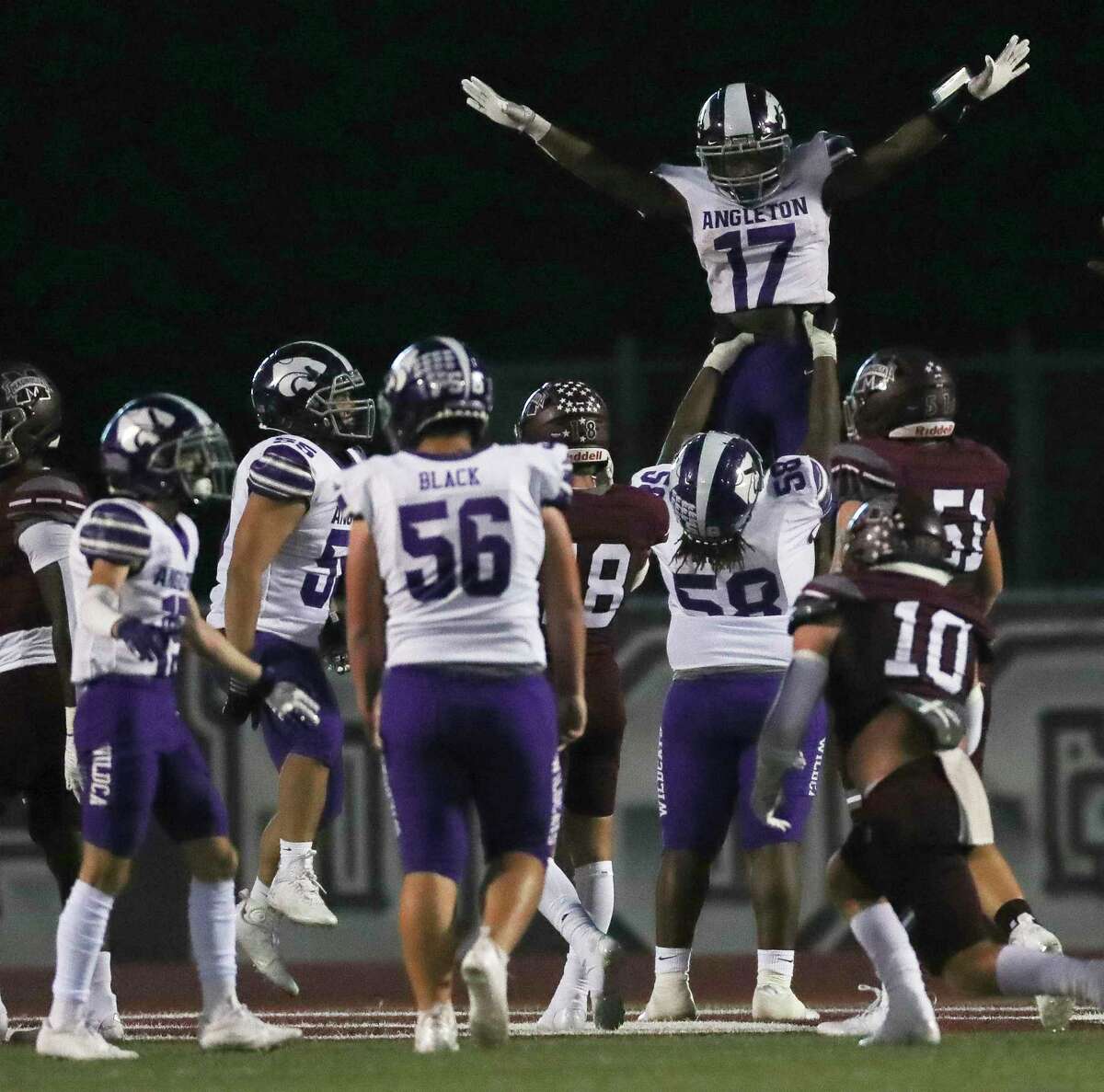 Angleton holds off Magnolia for district road victory