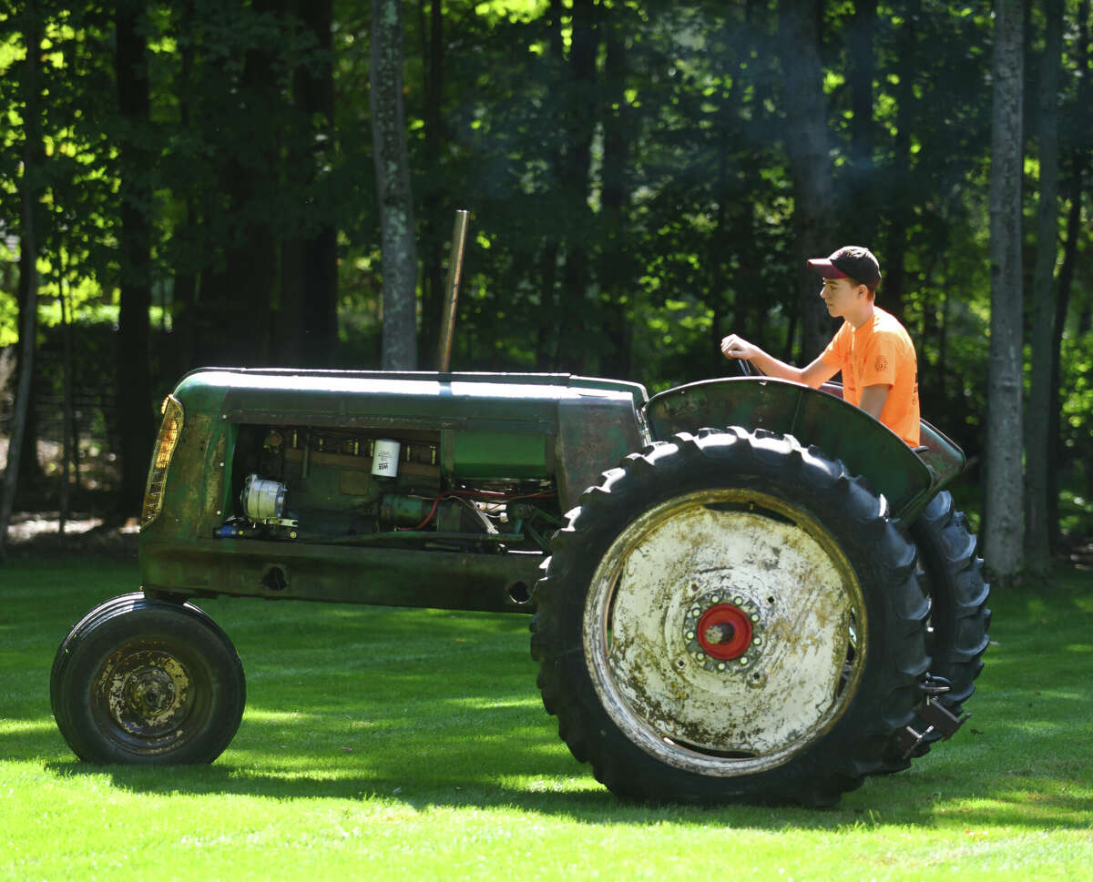 Greenwich teen's love to fix tractors made him a TikTok star