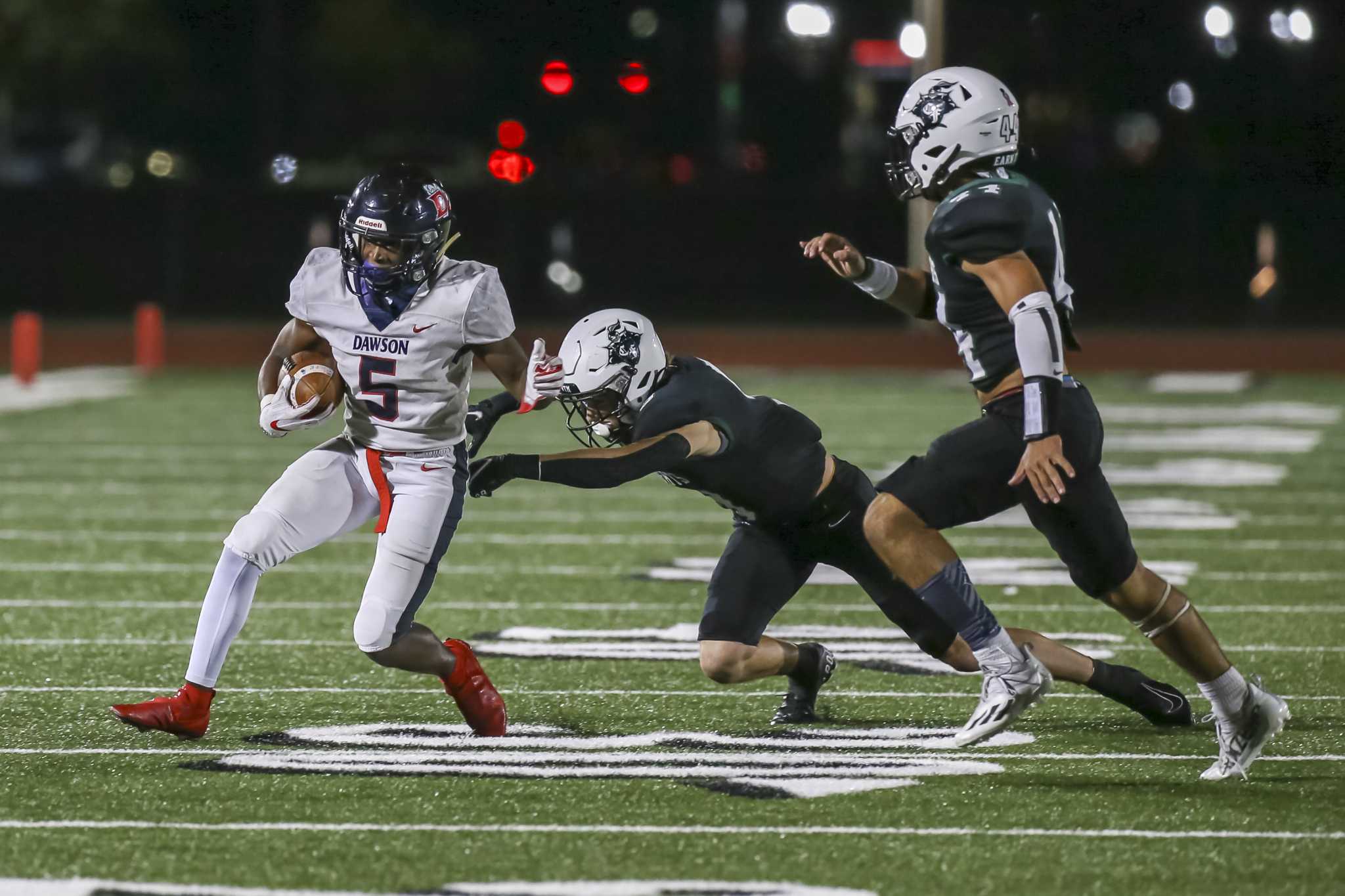 HS football: Dawson, Alief Taylor battle for share of District 23-6A lead