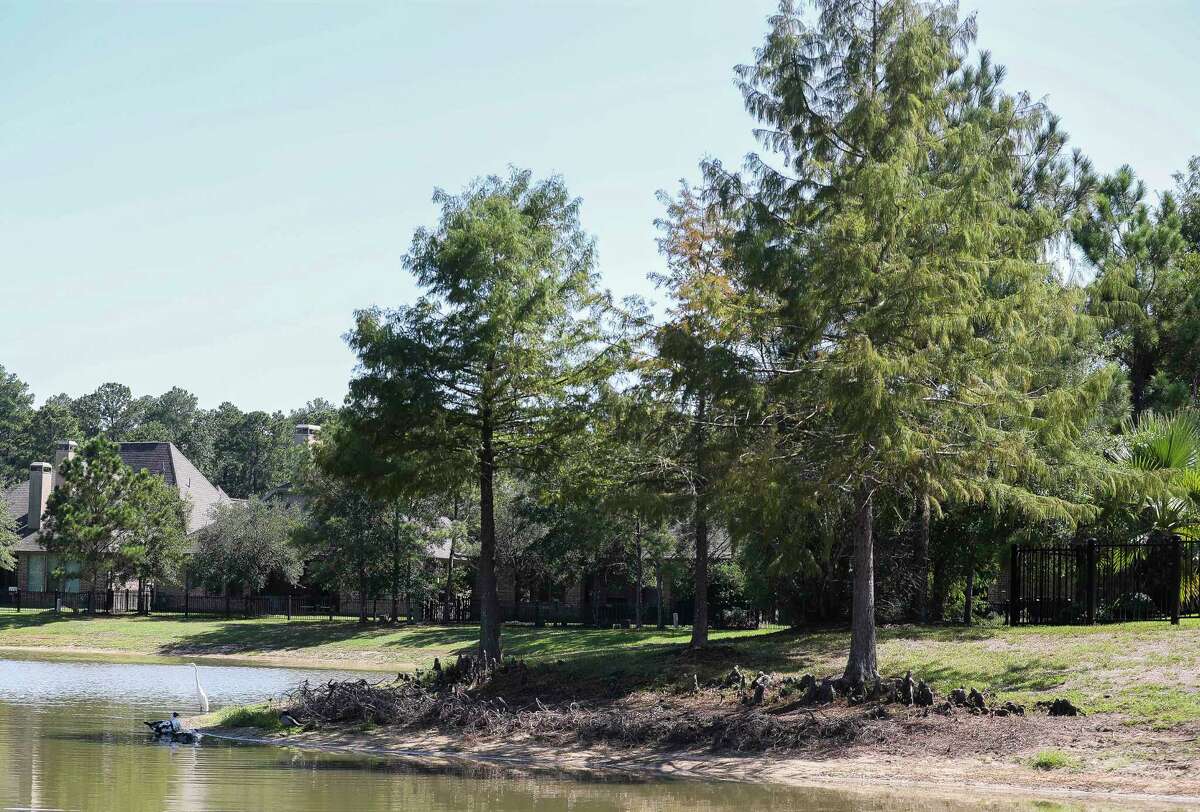 Woodlands tries to refill lakes and ponds -- without making the ground ...
