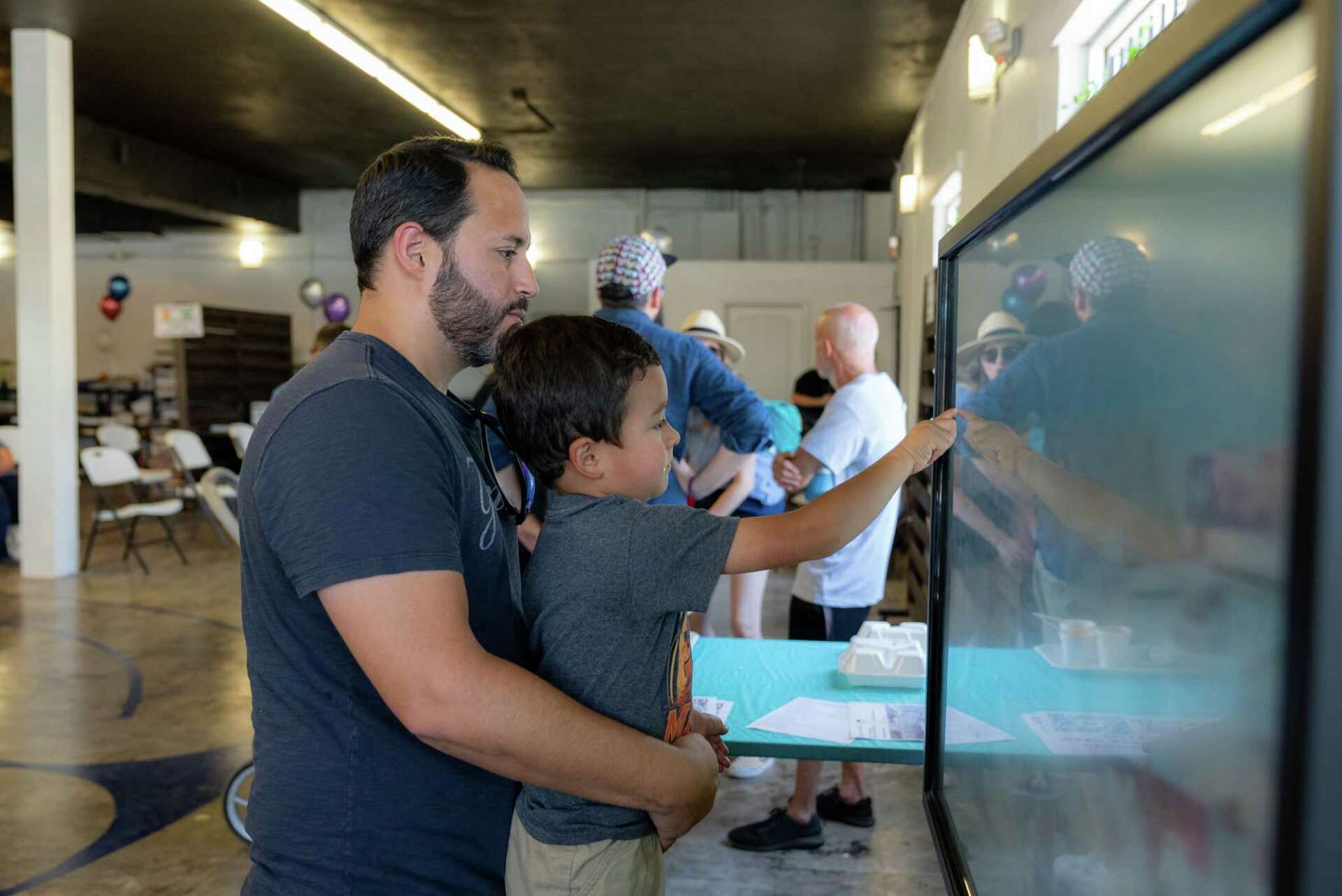 Hundreds of Houston Latino artists shine in digital billboard