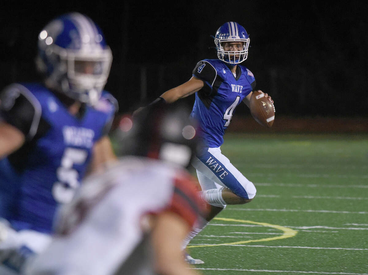 Darien plays Fairfield Warde in a FCIAC high school football game