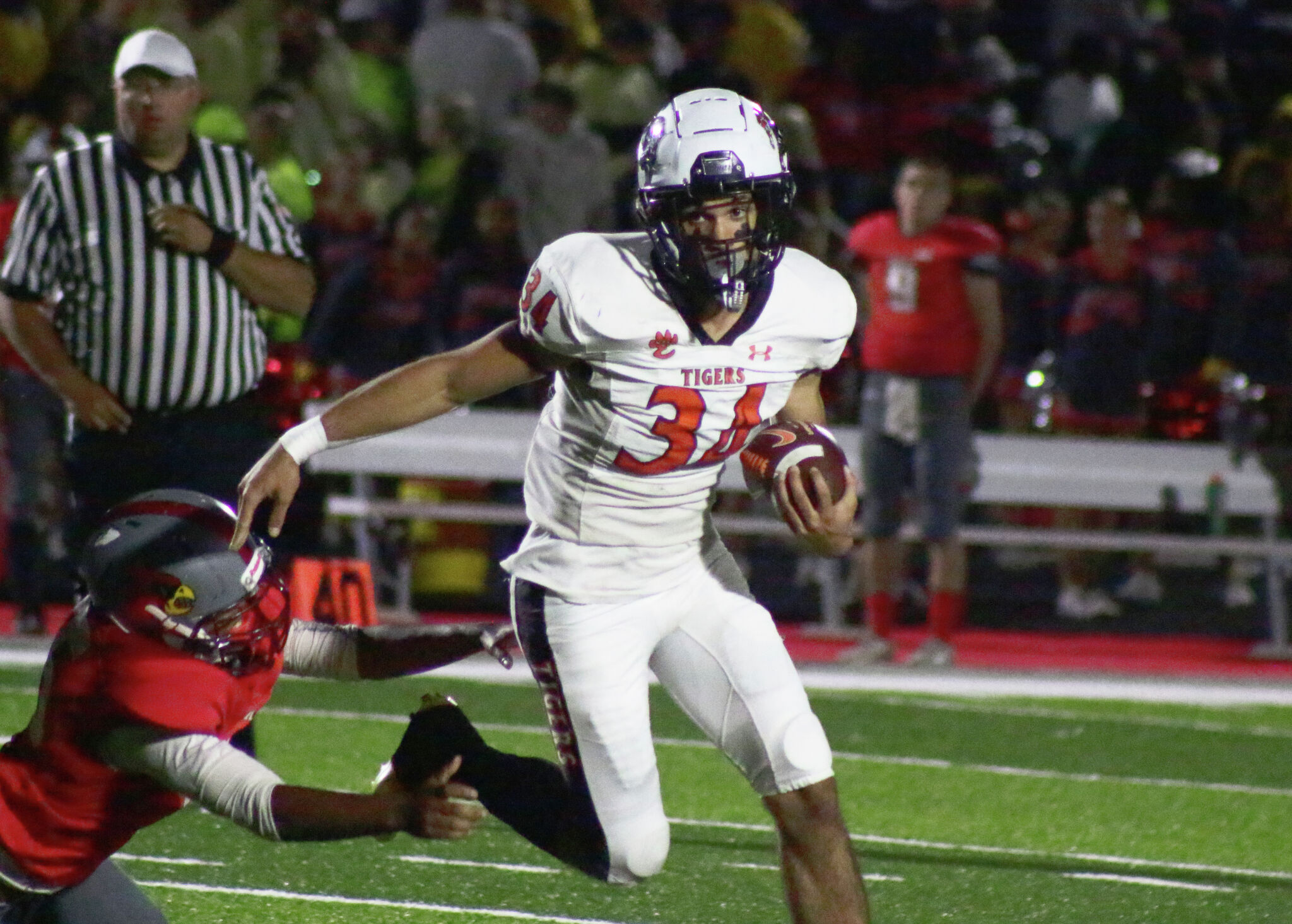 Edwardsville Tigers become playoff eligible after 51-6 win over Alton