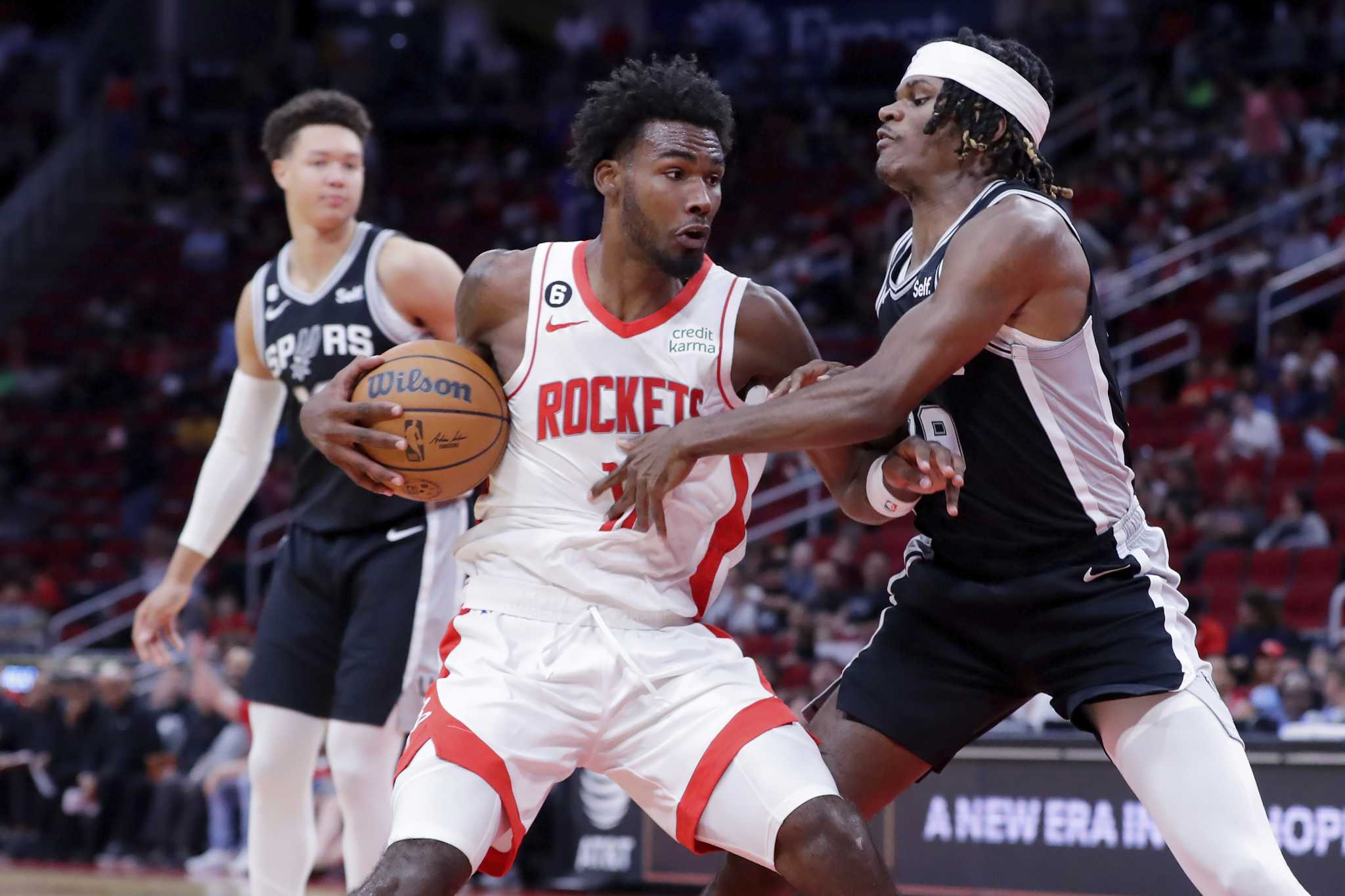 Spurs churn bottom of roster