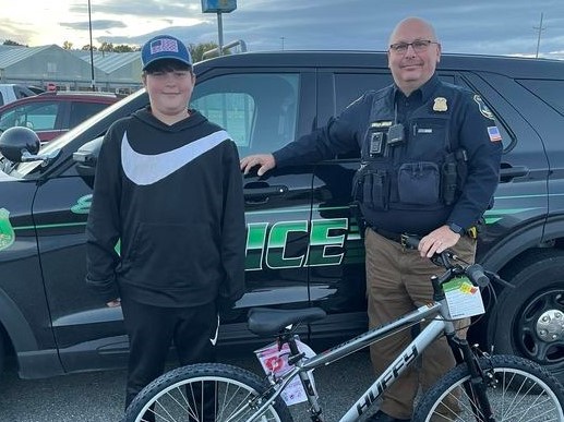 Elkton community member and police donate bike to theft victim