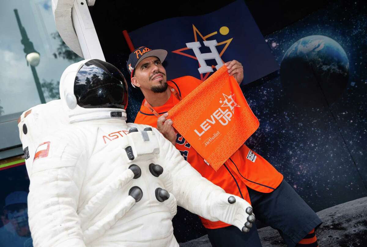 Astros fans don't let work stop them from attending ALDS game