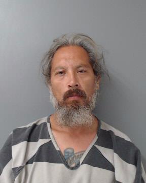 Man accused of restraining woman