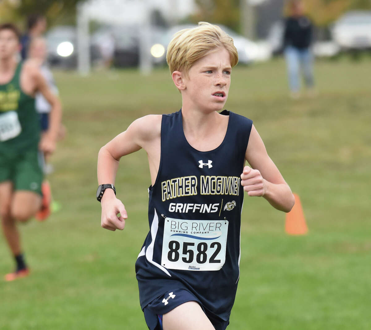 Father McGivney runners sweep GMC championships