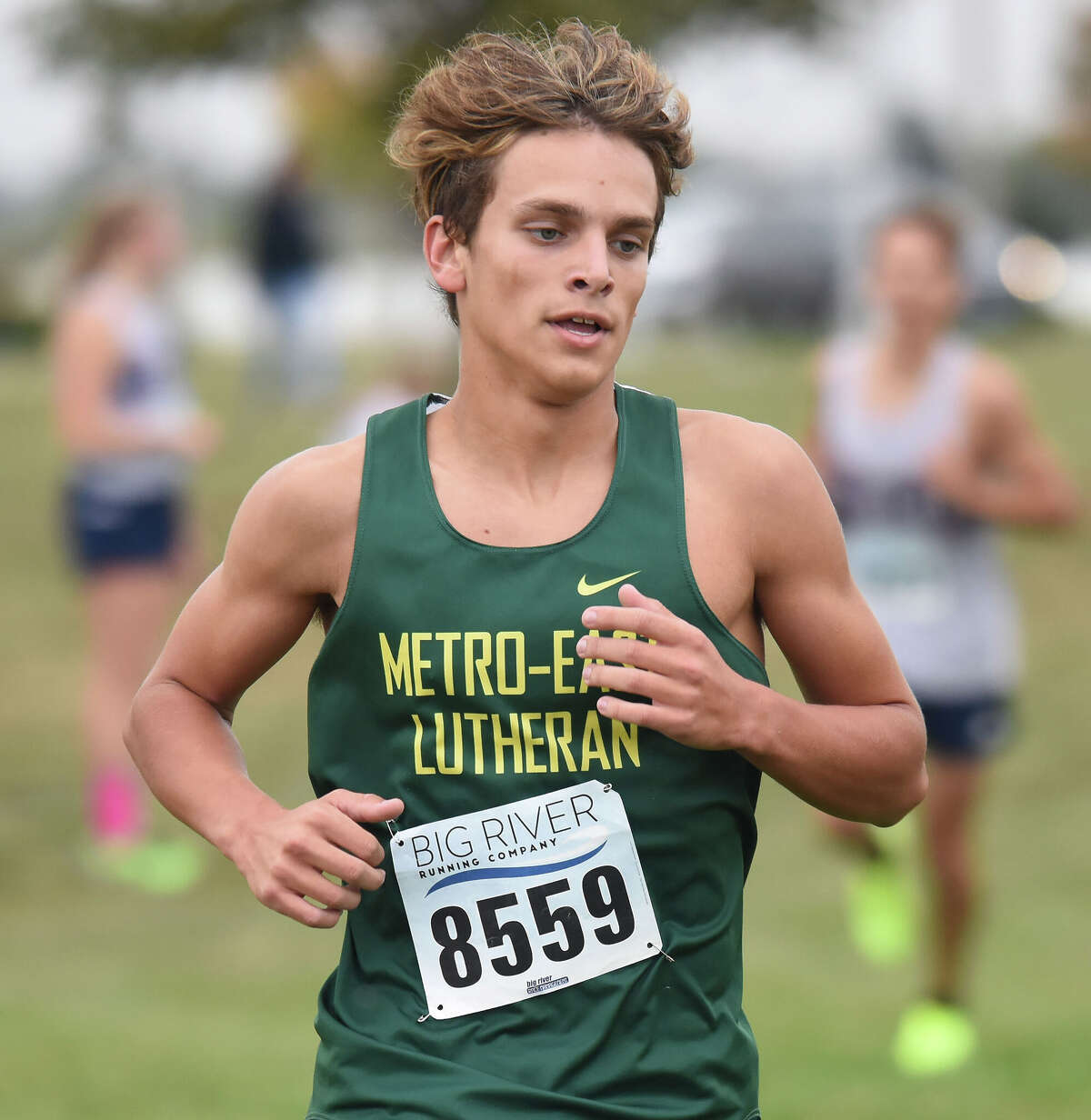 Father McGivney runners sweep GMC championships