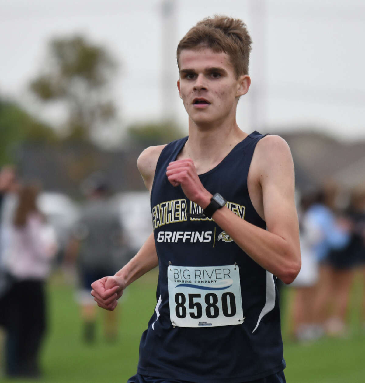 Father McGivney runners sweep GMC championships