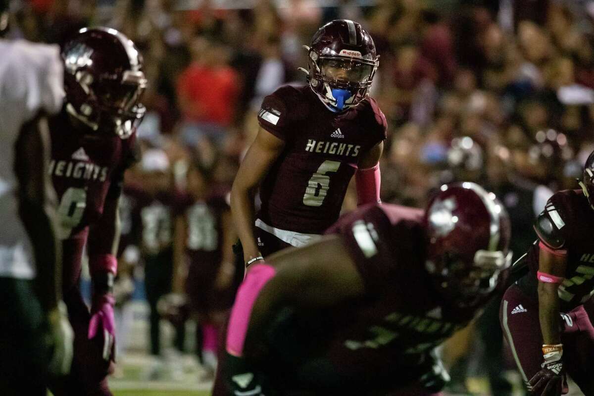 Heights Bulldogs hold off Westside Wolves