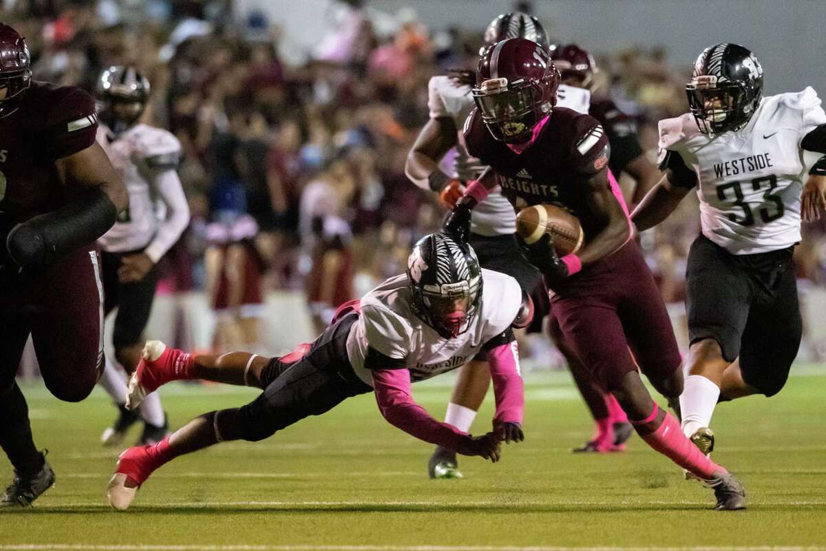 Heights Bulldogs hold off Westside Wolves