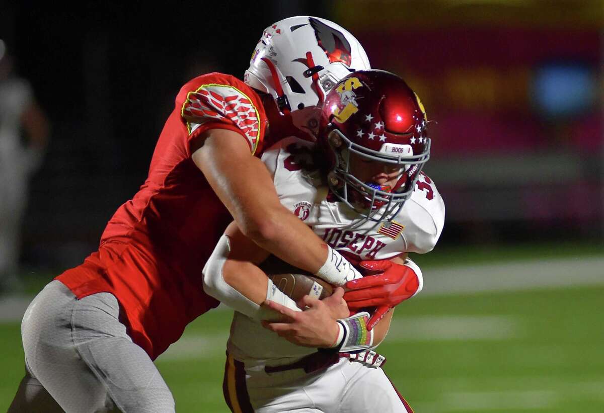 Greenwich football's DeLuca guided by late father's inspiration.