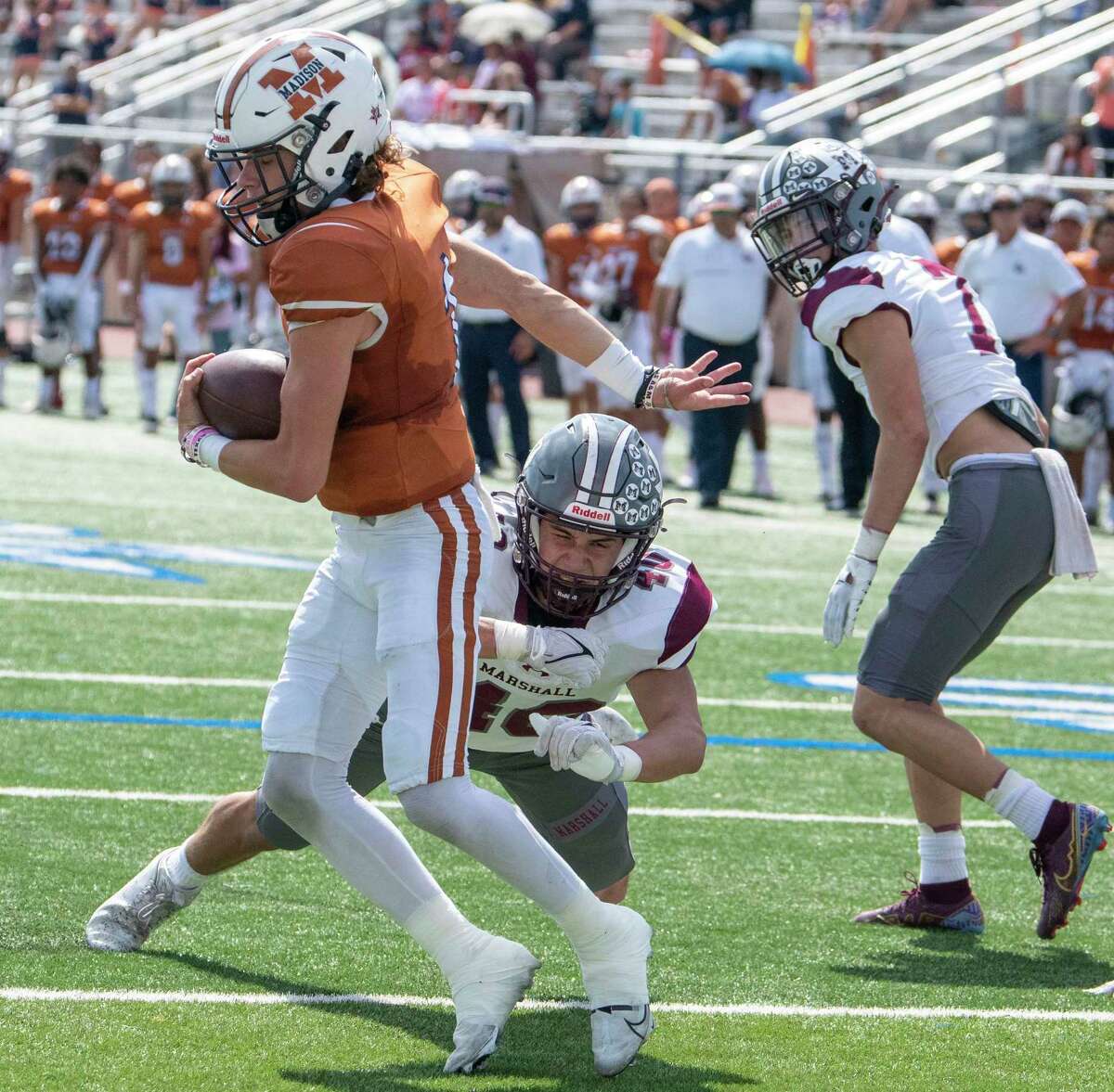 High school football: Madison 49, Marshall 7