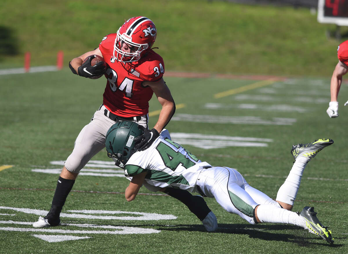 No. 2 New Canaan football blanks Norwalk for fifth straight win.