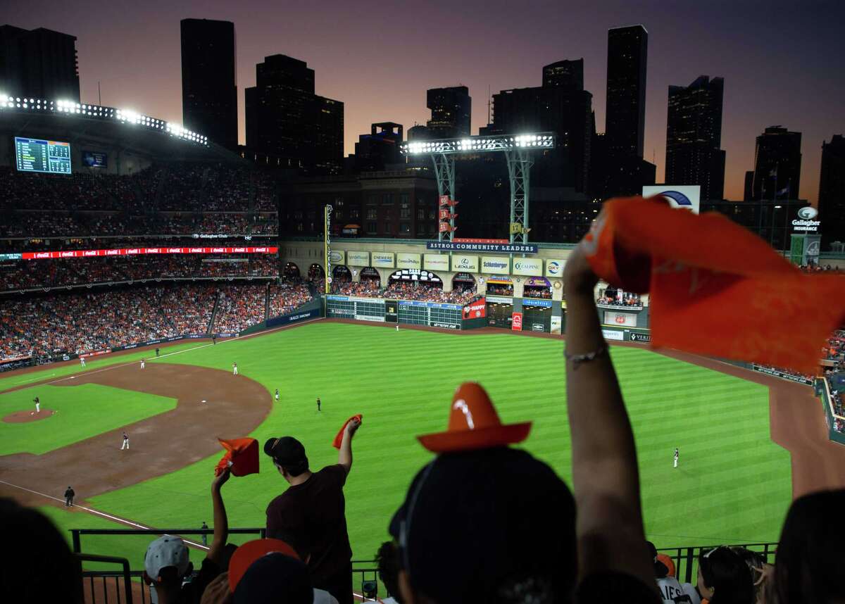 Astros fans like the open roof at Minute Maid
