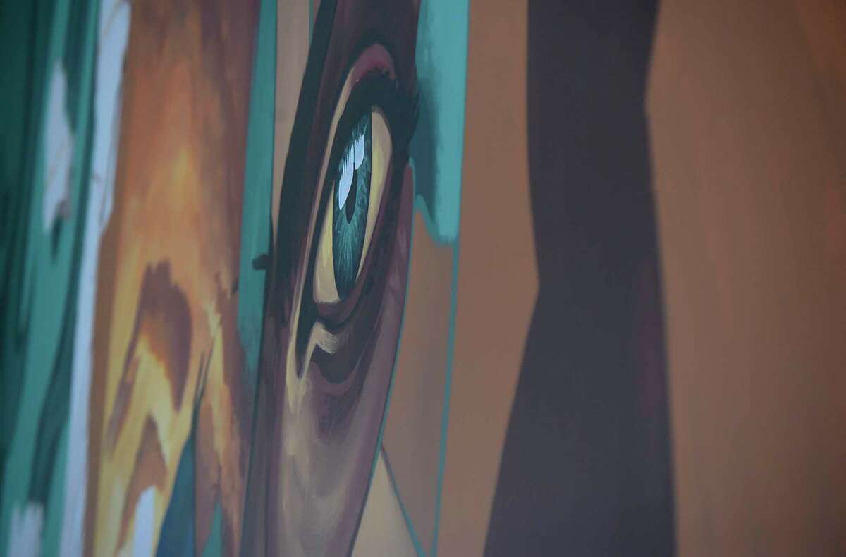 Kiptoe painting 1,800 square-foot mural at Danbury Fair Mall