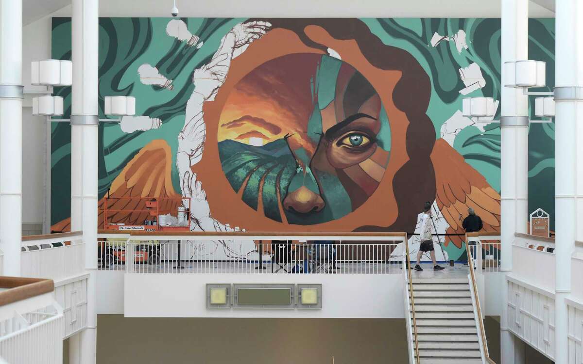 Kiptoe painting 1,800 square-foot mural at Danbury Fair Mall