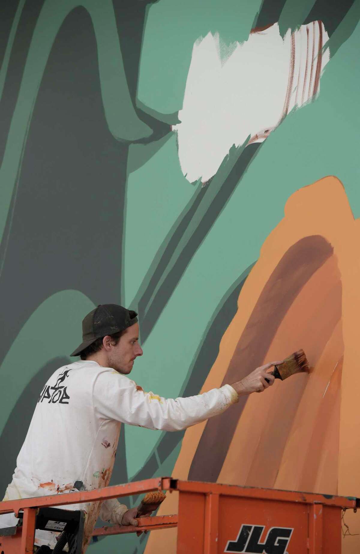 Kiptoe painting 1,800 square-foot mural at Danbury Fair Mall